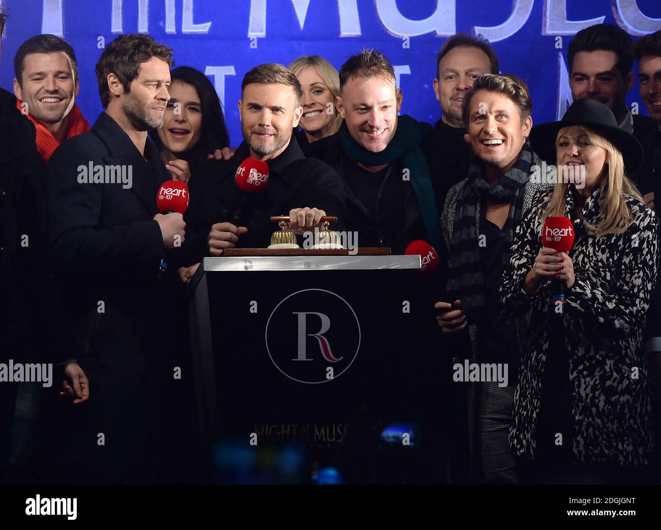 Gary Barlow, Howard Donald and Mark Owen from Take That switch on the ...