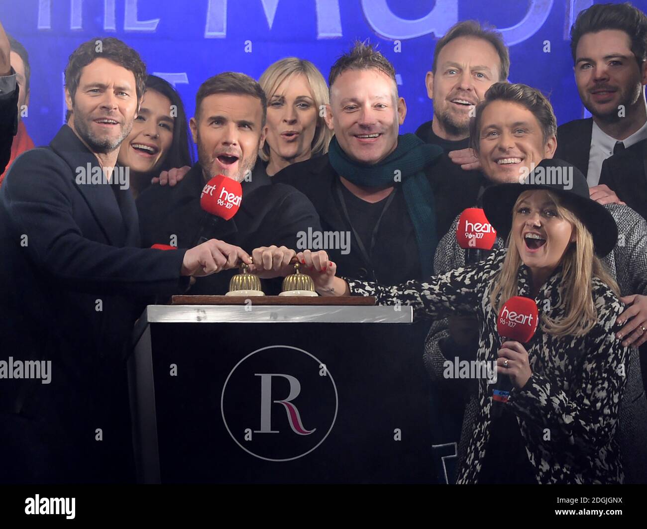 Gary Barlow, Howard Donald and Mark Owen from Take That switch on the ...
