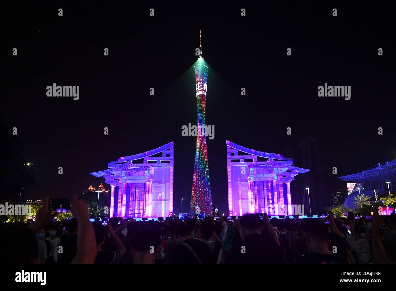 People watch the light show at the 2020 Guangzhou International Light Festival in Guangzhou city ...