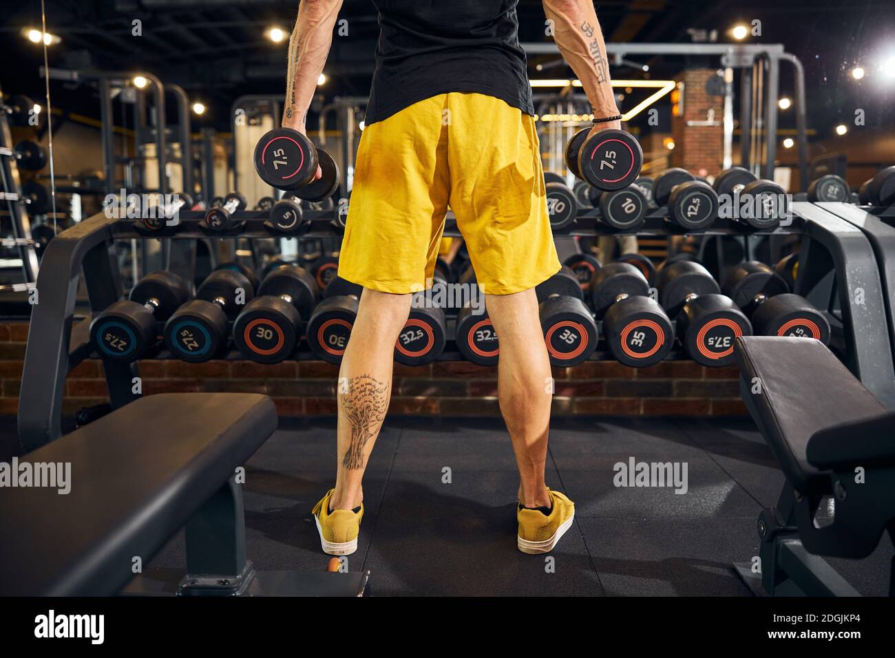Male athlete getting ready for the strength workout Stock Photo - Alamy