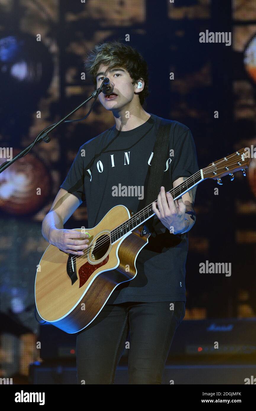 EXCLUSIVE *** Calum Hood of 5 Seconds of Summer live on stage during ...