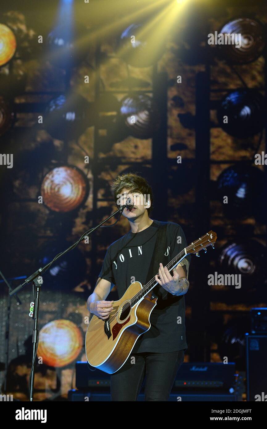EXCLUSIVE *** Calum Hood of 5 Seconds of Summer live on stage during ...