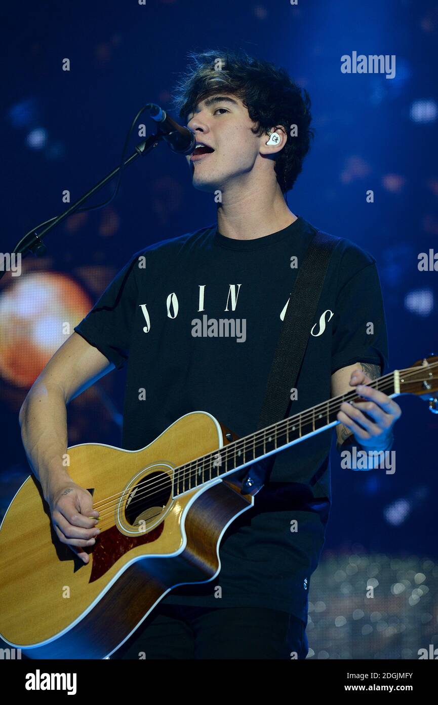 EXCLUSIVE *** Calum Hood of 5 Seconds of Summer live on stage during ...