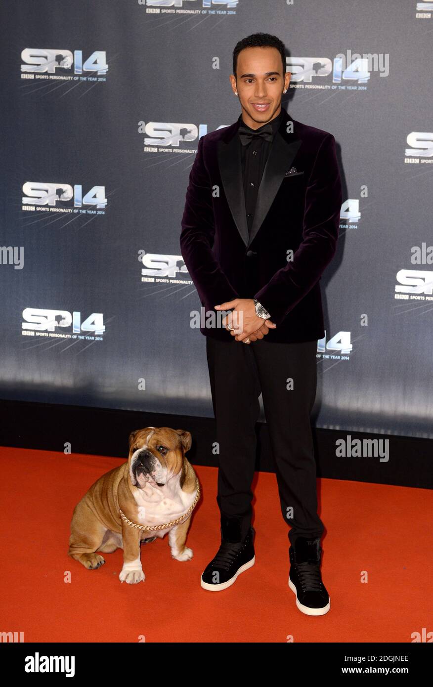 Lewis Hamilton and his dog Roscoe arriving for the 2014 Sports ...