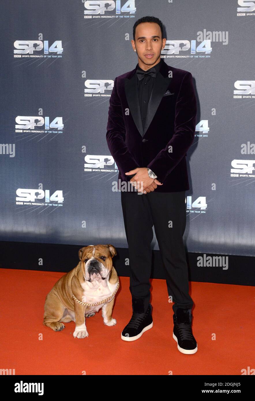 Lewis Hamilton and his dog Roscoe arriving for the 2014 Sports ...