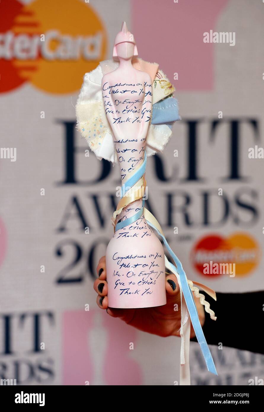 A trophy is displayed at the BRIT Awards 2015 Nominations launch held ...