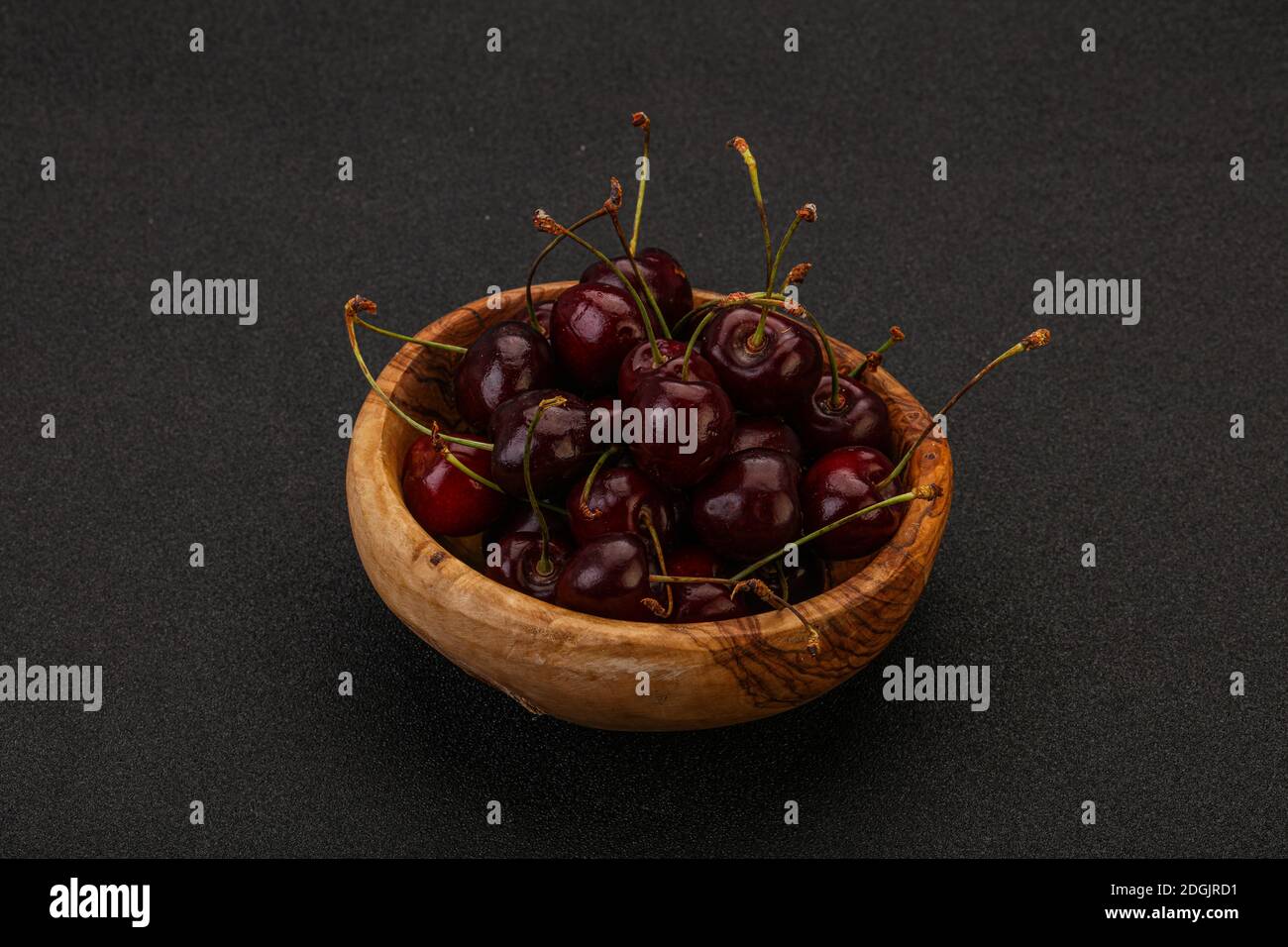 Sweet ripe bird cherry in the basket Stock Photo - Alamy