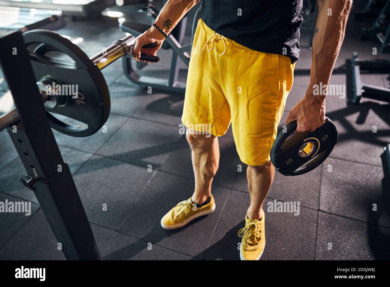 Experienced male athlete getting ready for strength training Stock ...