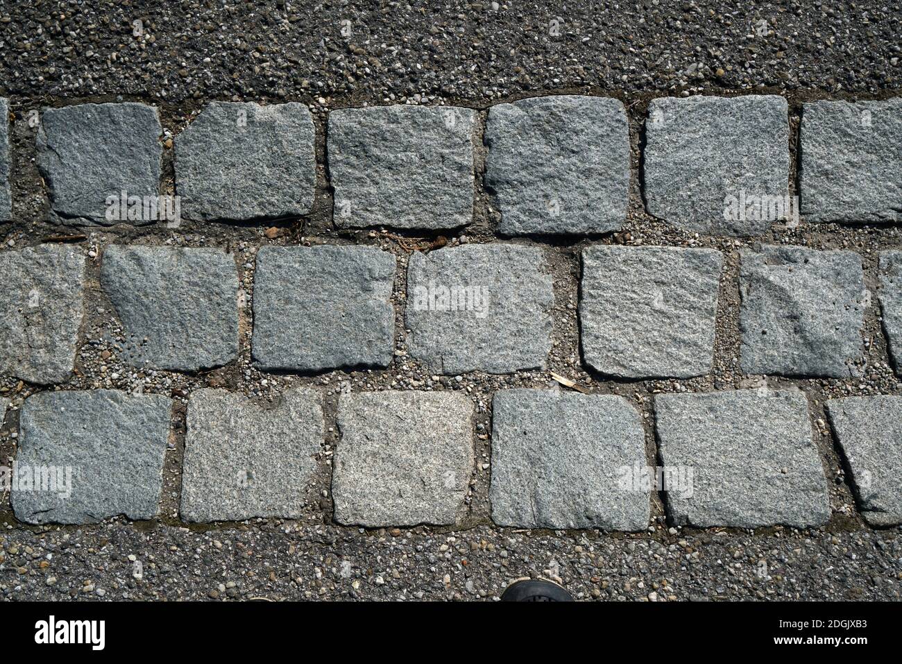 Cobblestone artistically laid in a park in Bavaria Stock Photo - Alamy