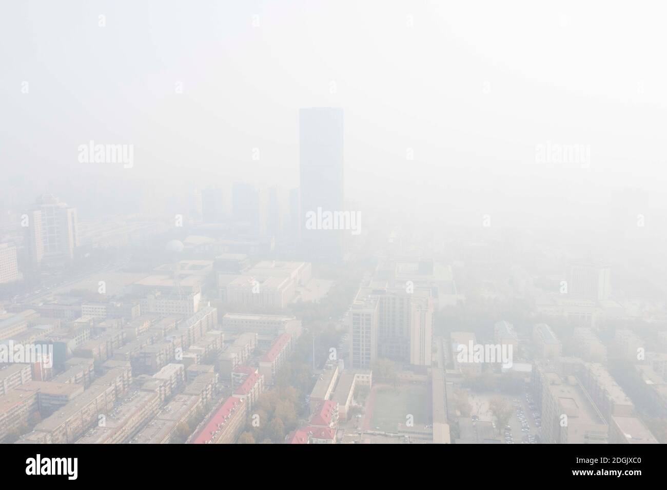--FILE--An aerial view of buildings at downtown area covered by severe ...
