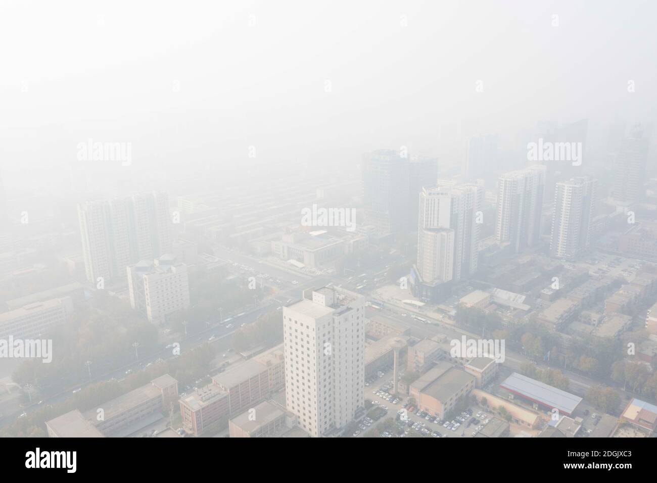 --FILE--An aerial view of buildings at downtown area covered by severe ...