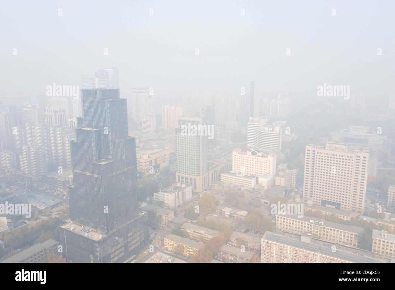 --FILE--An aerial view of buildings at downtown area covered by severe ...