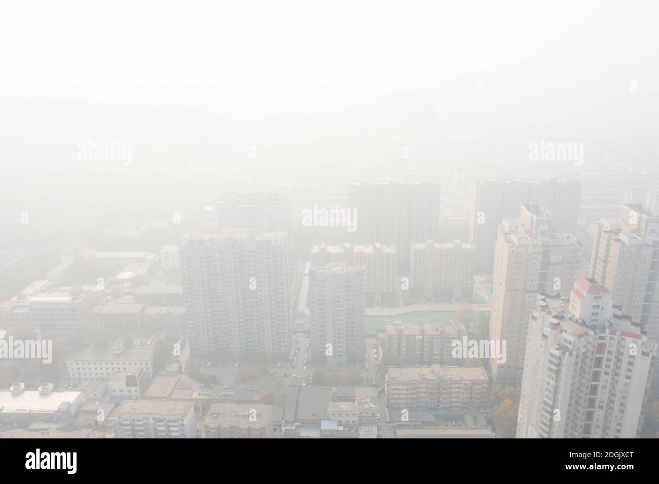 --FILE--An aerial view of buildings at downtown area covered by severe ...