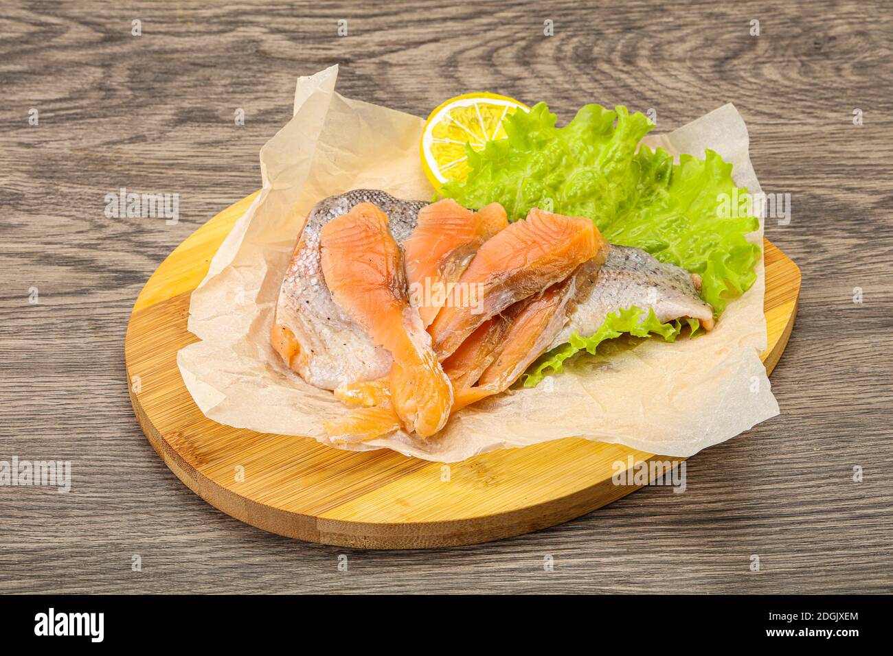 Sliced natural wild trout fillet over board Stock Photo - Alamy