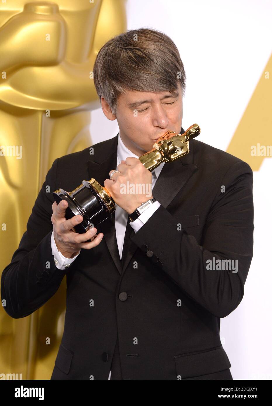 Tom Cross with the Best Editing Award for 'Whiplash', in the press room ...