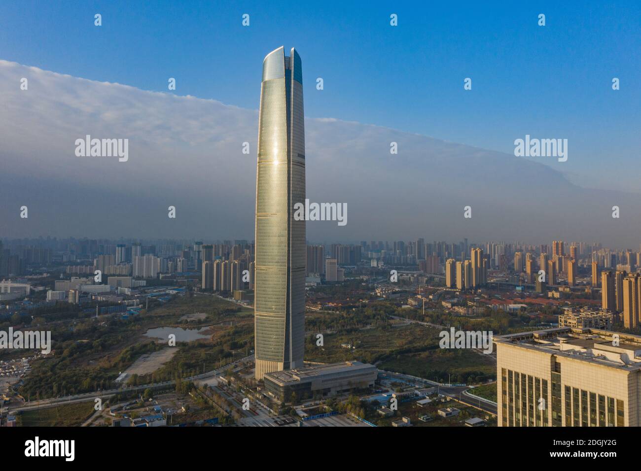 An aerial view of Wuhan Center, a local super tall skyscraper, erecting ...