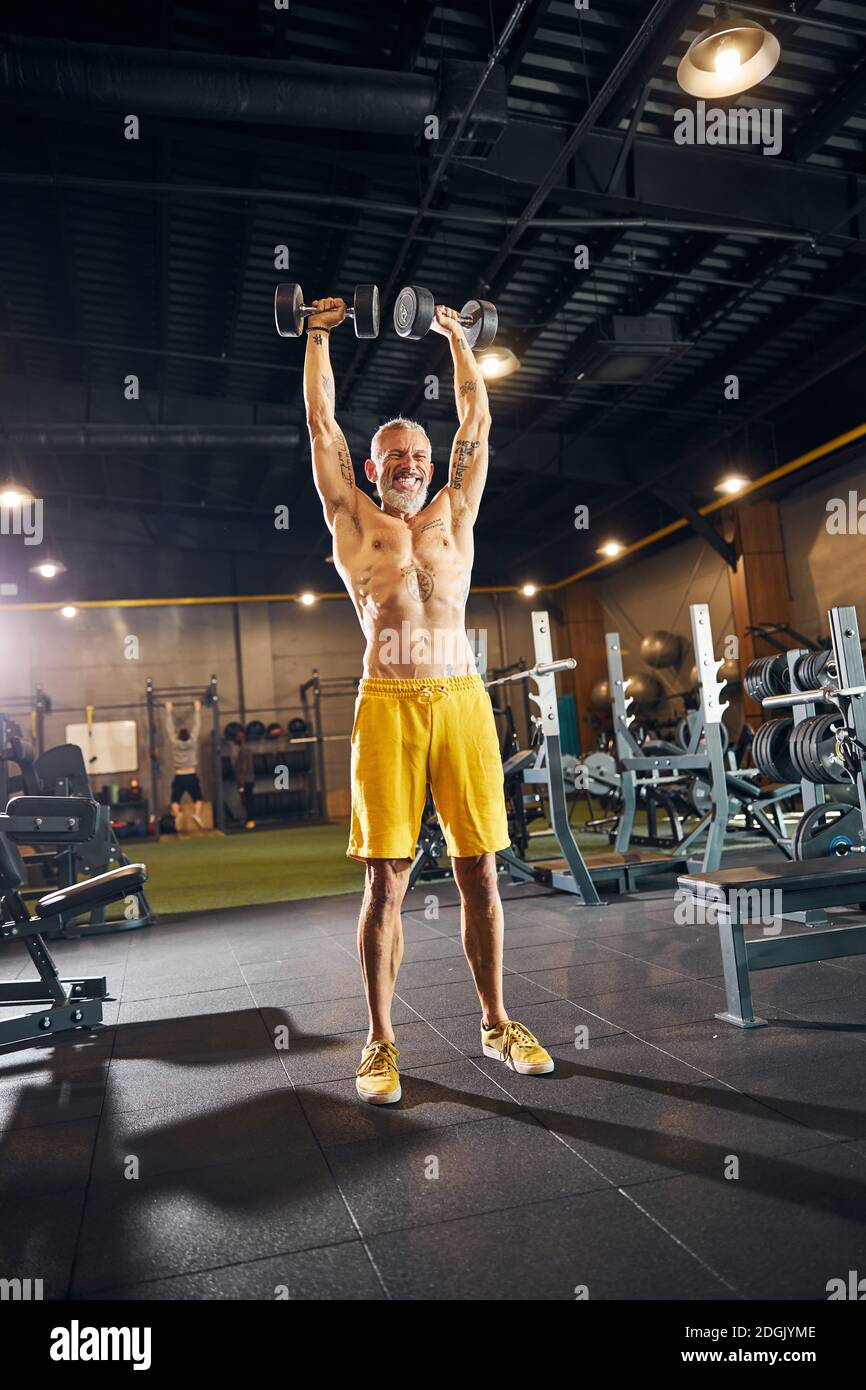 Overhead press, fit male hi-res stock photography and images - Alamy