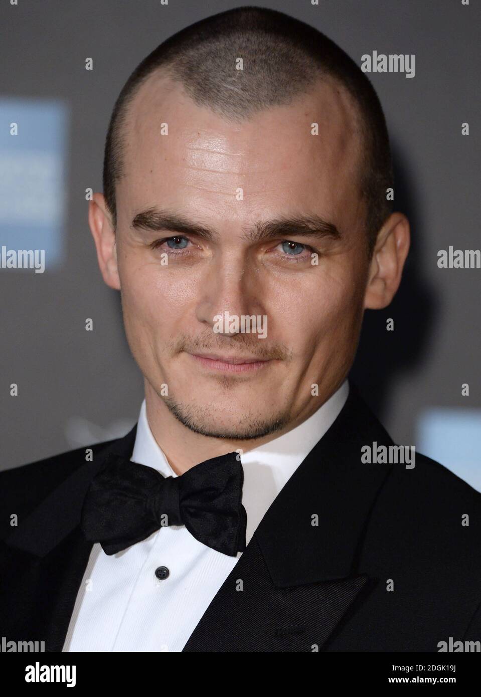 Rupert Friend arriving at the Alexander McQueen: Savage Beauty ...