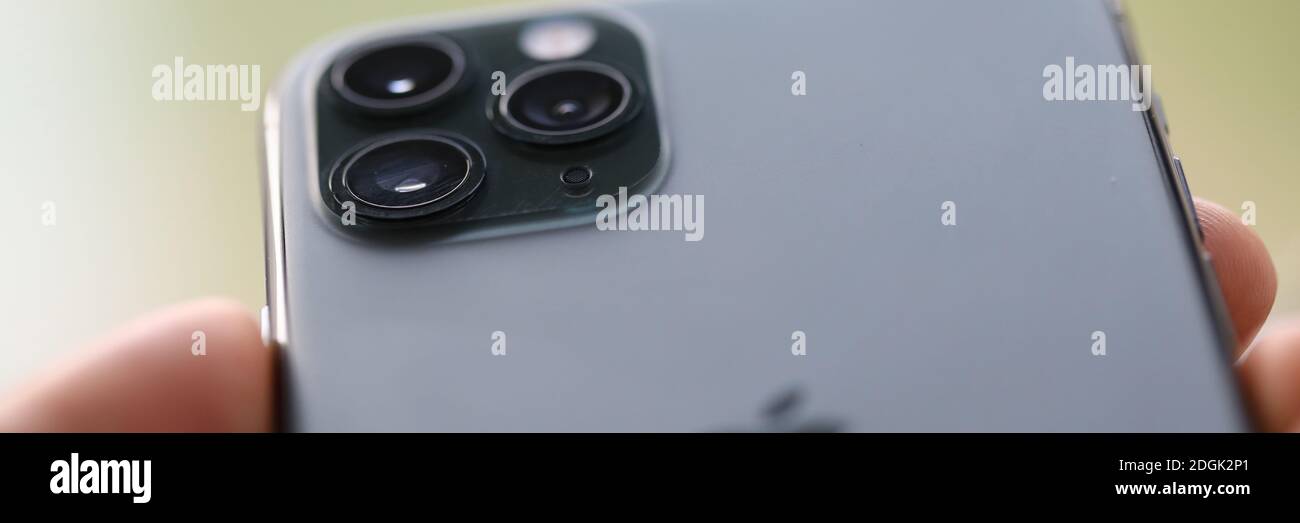 Iphone apple logo man hi-res stock photography and images - Alamy