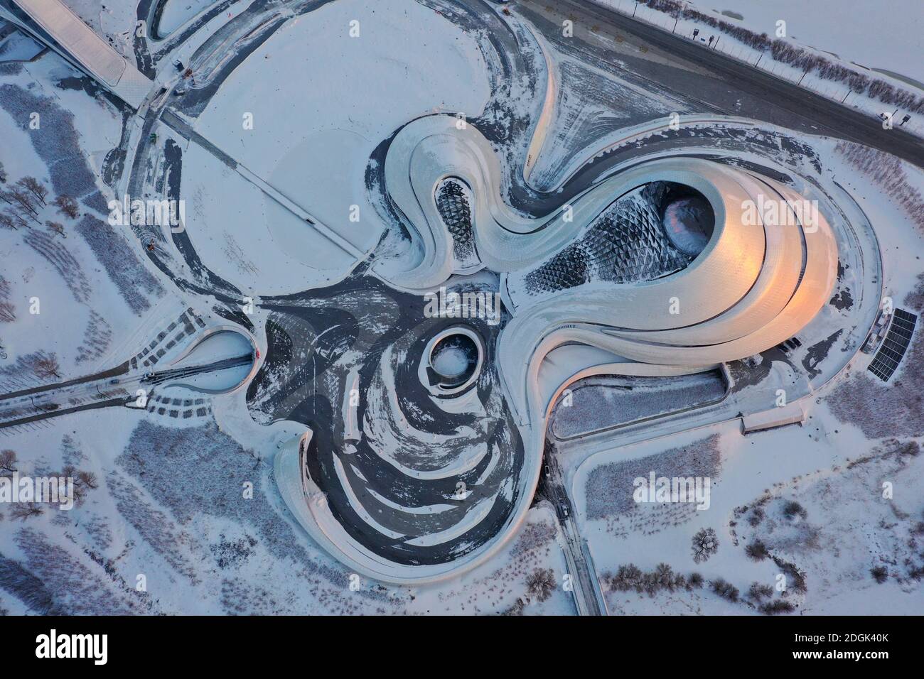 Aerial view of Harbin Opera House covered in snow, which is spectacular ...