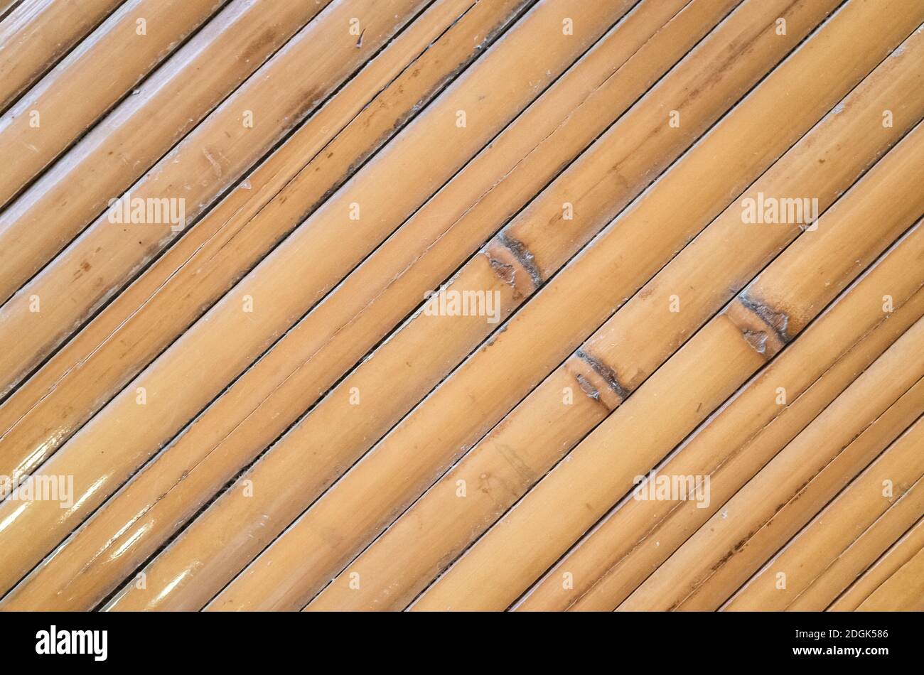 Yellow bamboo craft background Stock Photo - Alamy