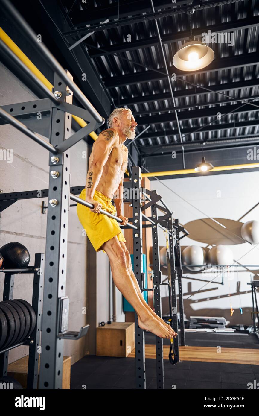Professional fitness instructor doing the gymnastic exercise Stock ...