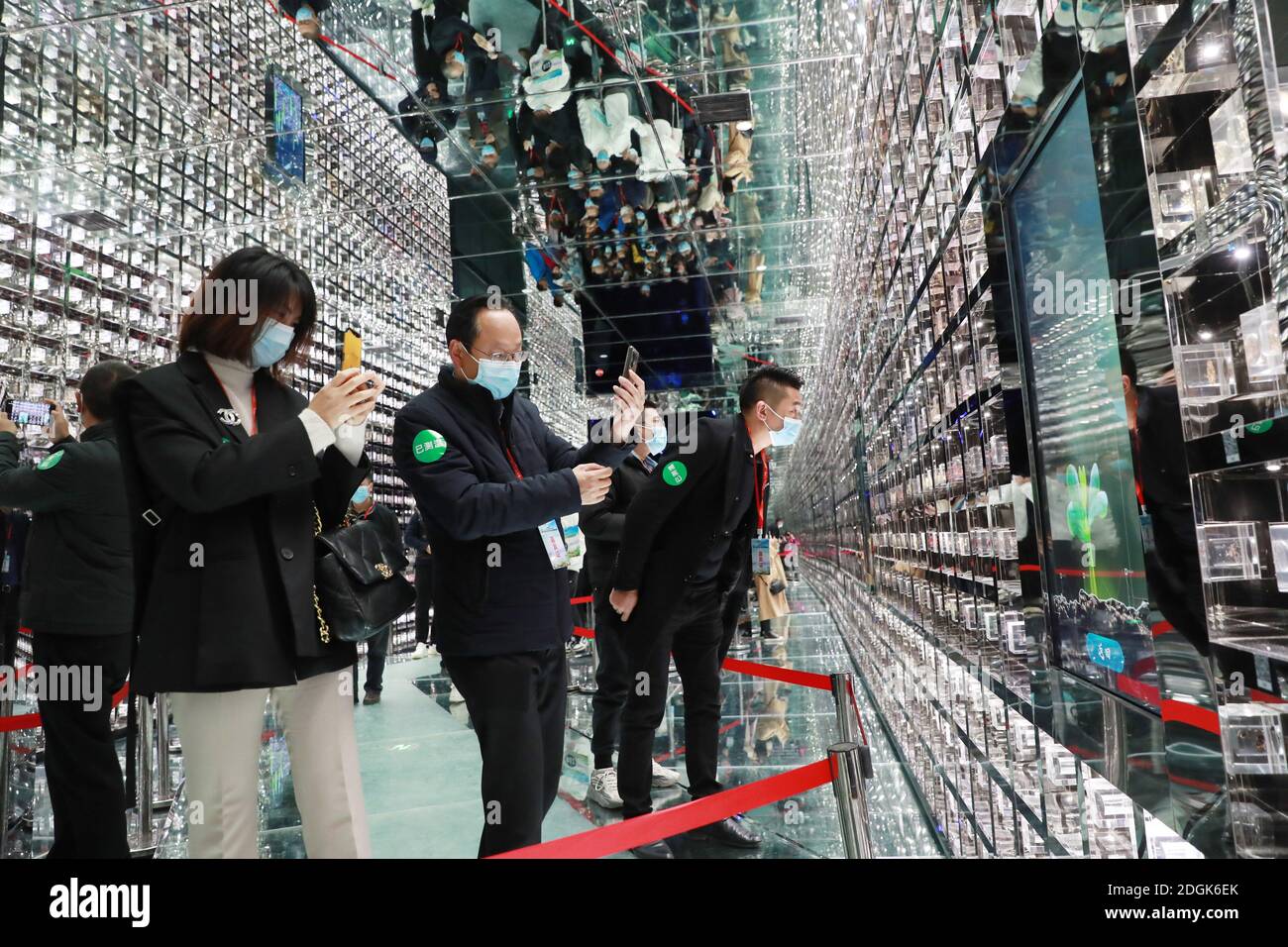 People observe the seeds preserved and presented at the "Seed Bank ...