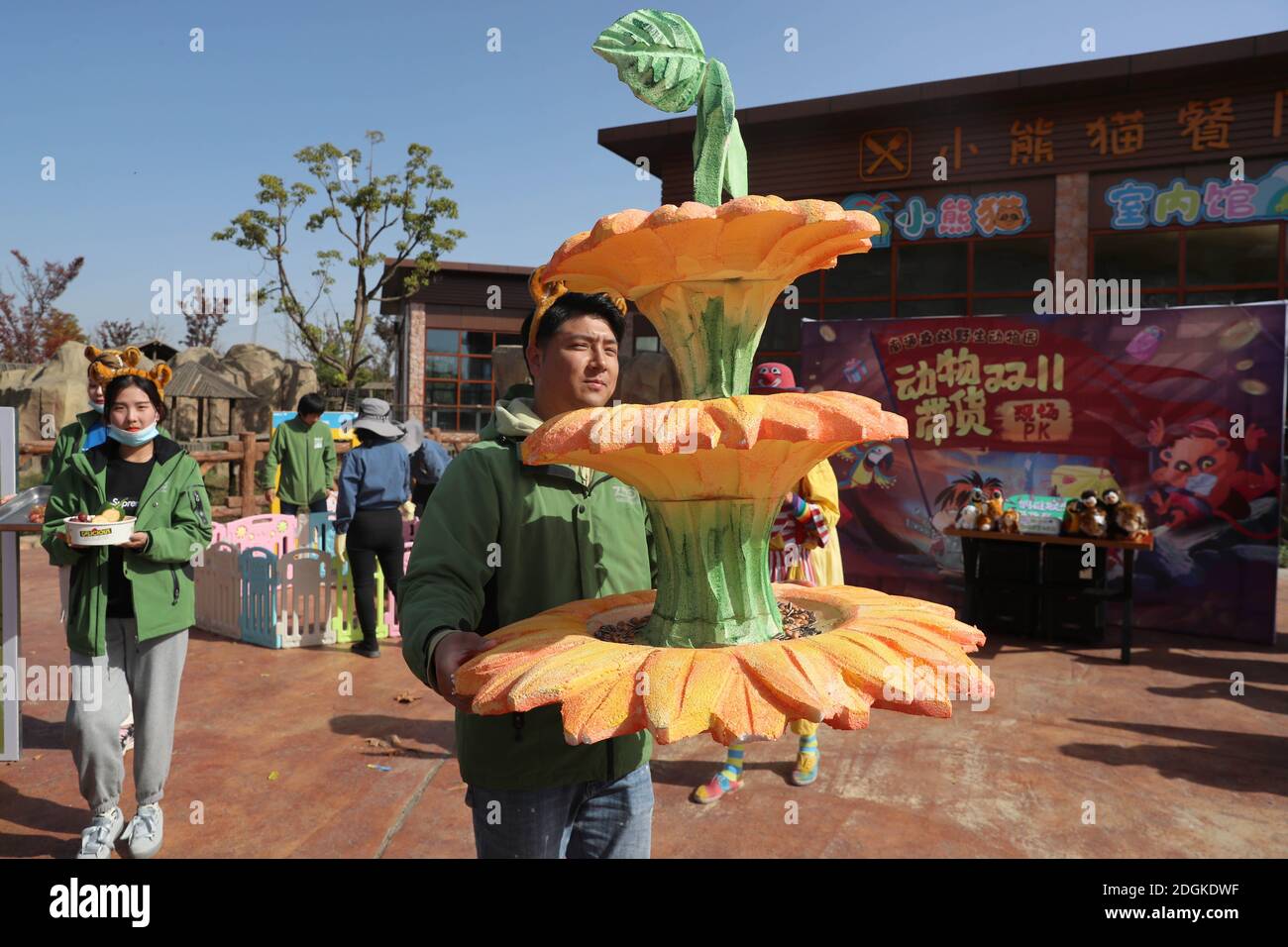 A zoo uses three groups of animal anchors to sell animal dolls ...