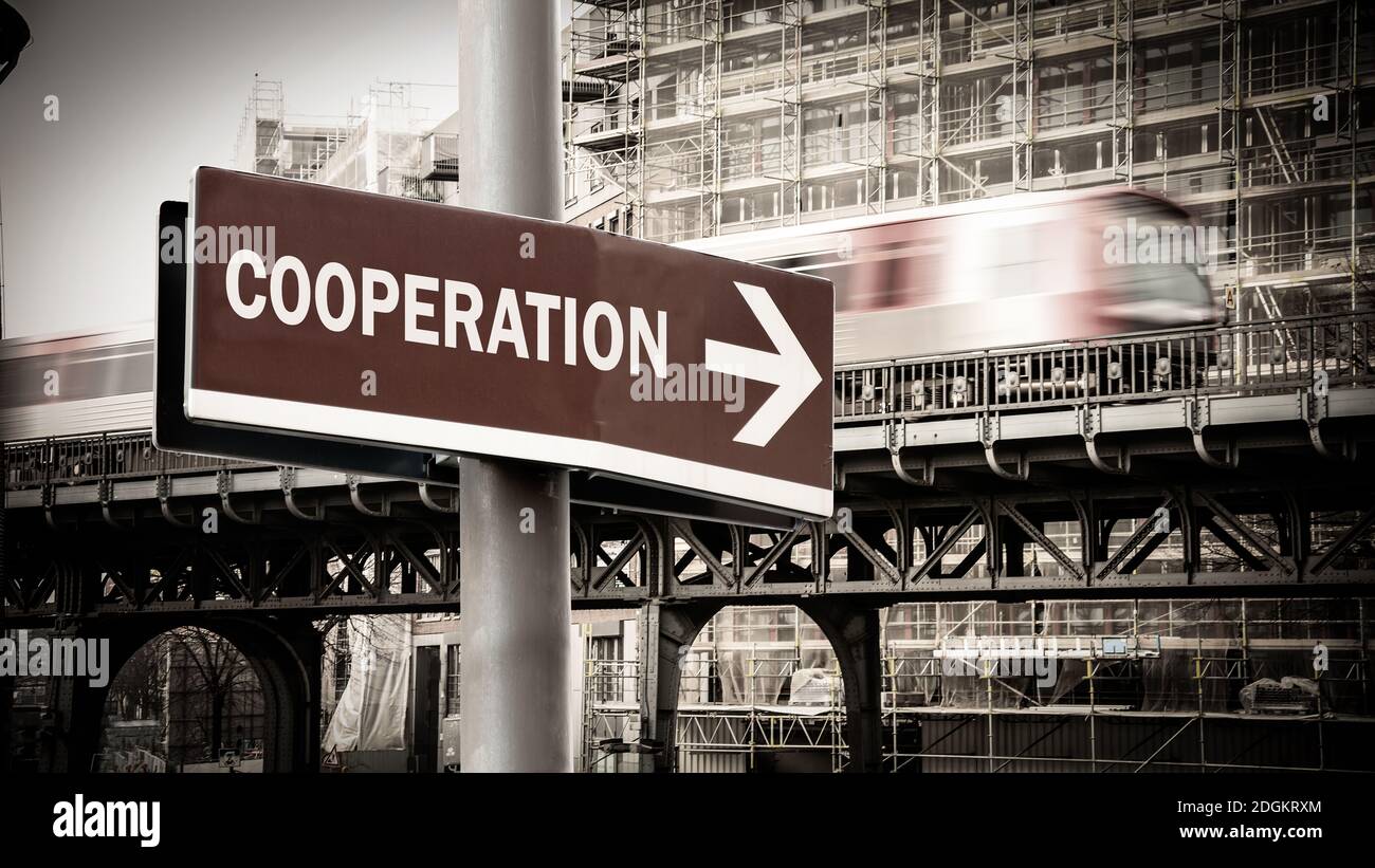 Street Sign to Cooperation Stock Photo - Alamy