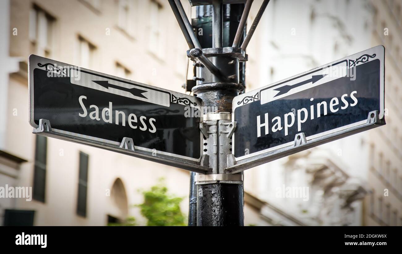 Street Sign Happiness versus Sadness Stock Photo - Alamy