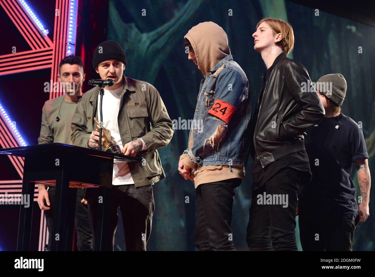 Bring Me The Horizon collect the NME Innovation Award on stage during ...