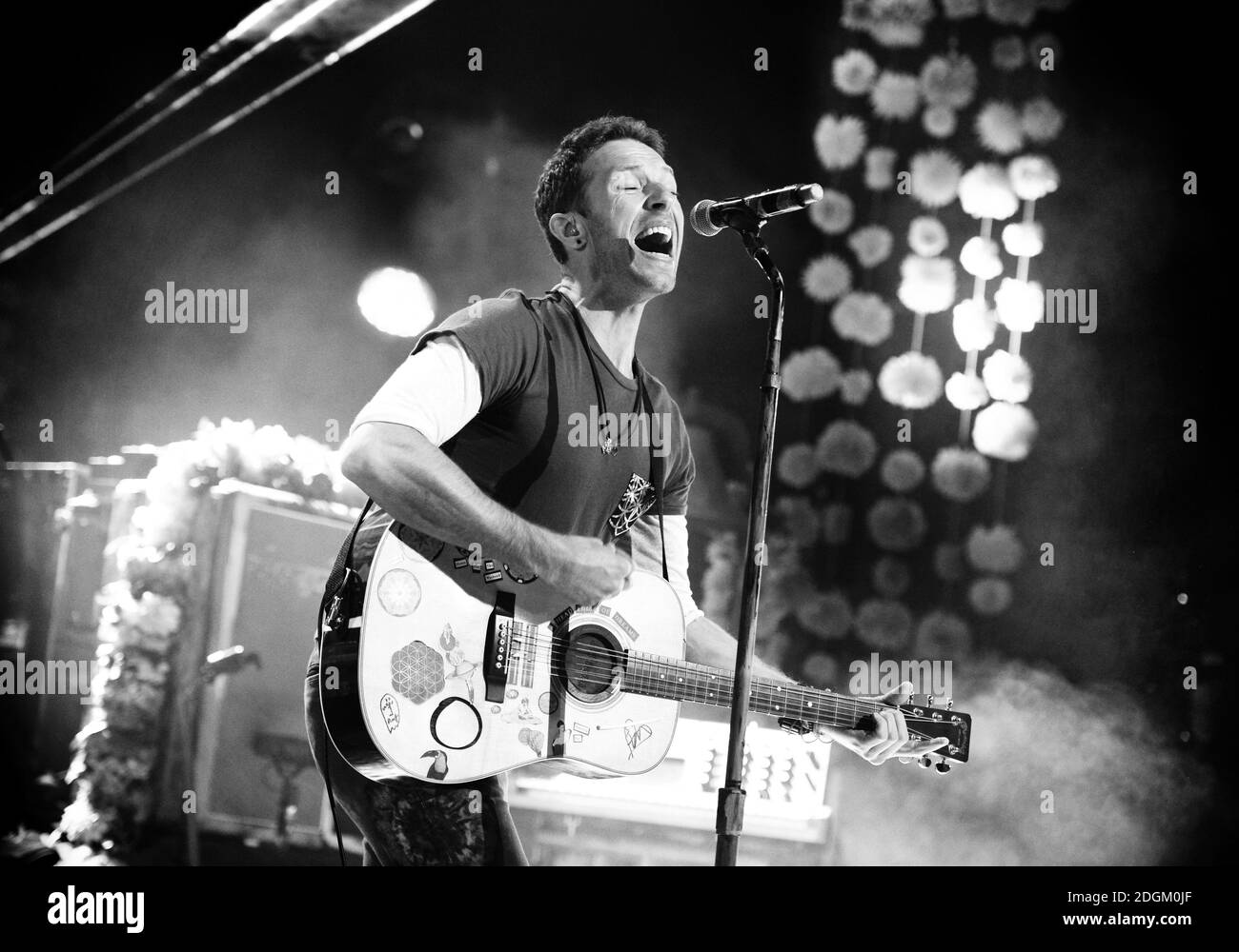 Chris Martin of Coldplay performing at the NME Awards 2016 with Austin ...