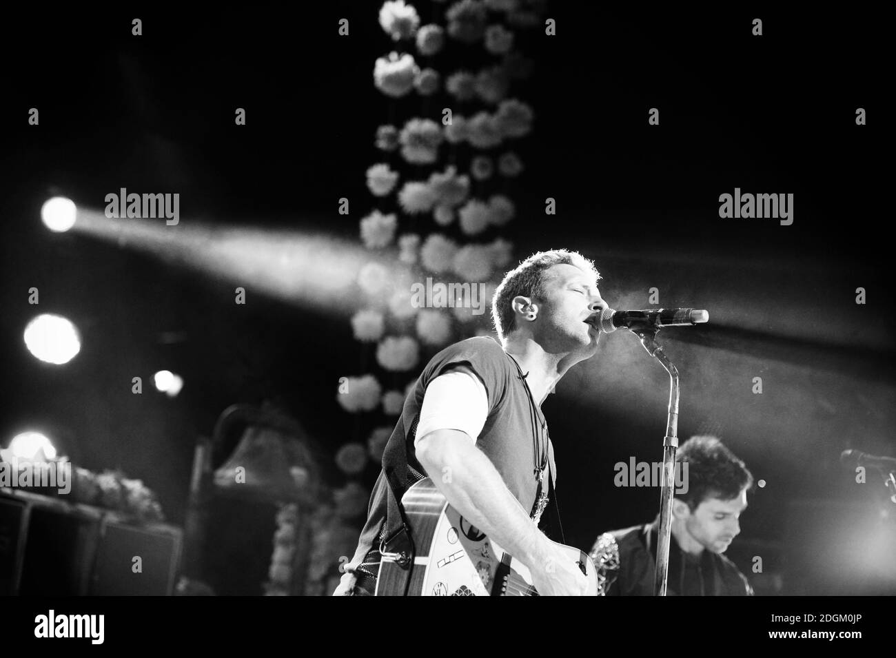 Chris Martin of Coldplay performing at the NME Awards 2016 with Austin ...