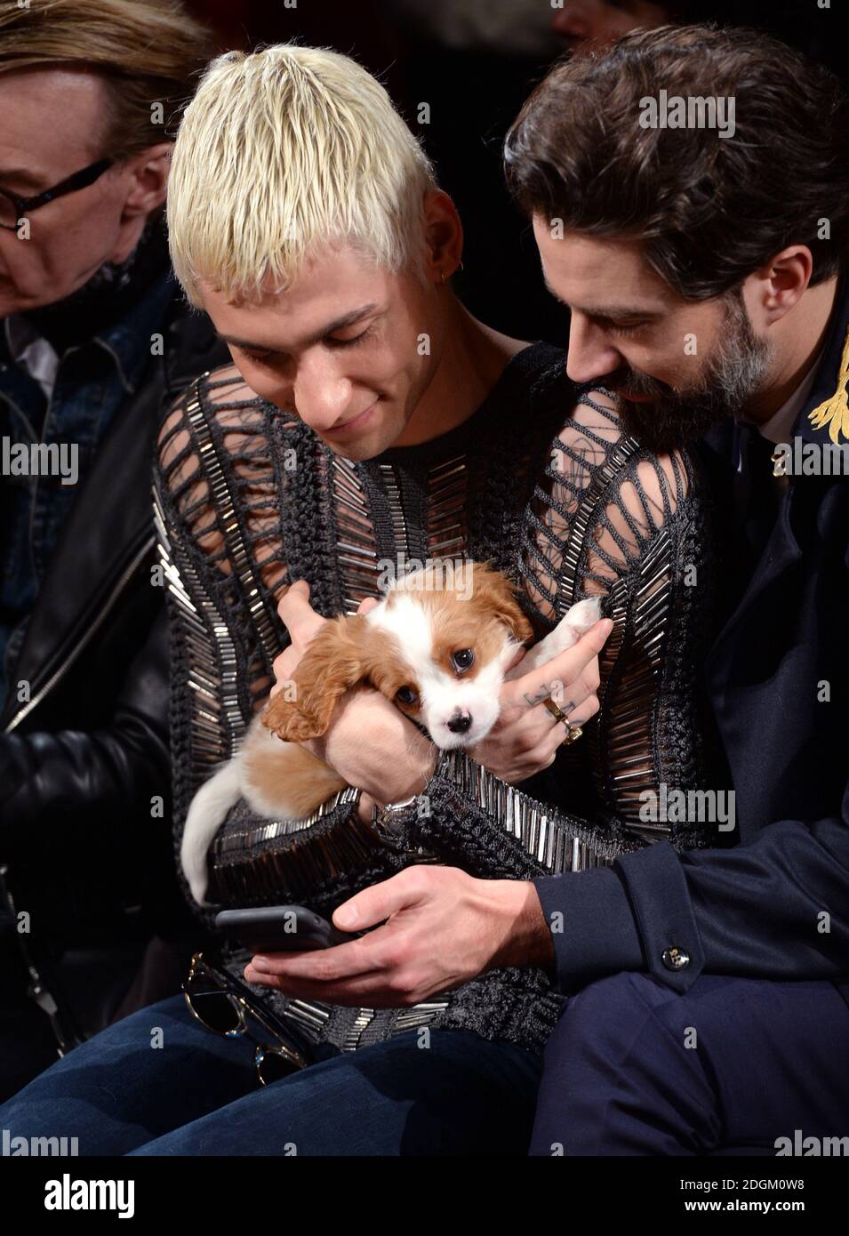 Guests with their puppy on the front row at the Julien Macdonald ...