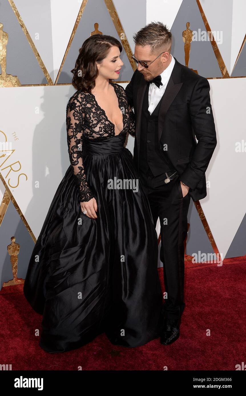 Tom Hardy and Charlotte Riley arriving at the 88th Academy Awards held ...