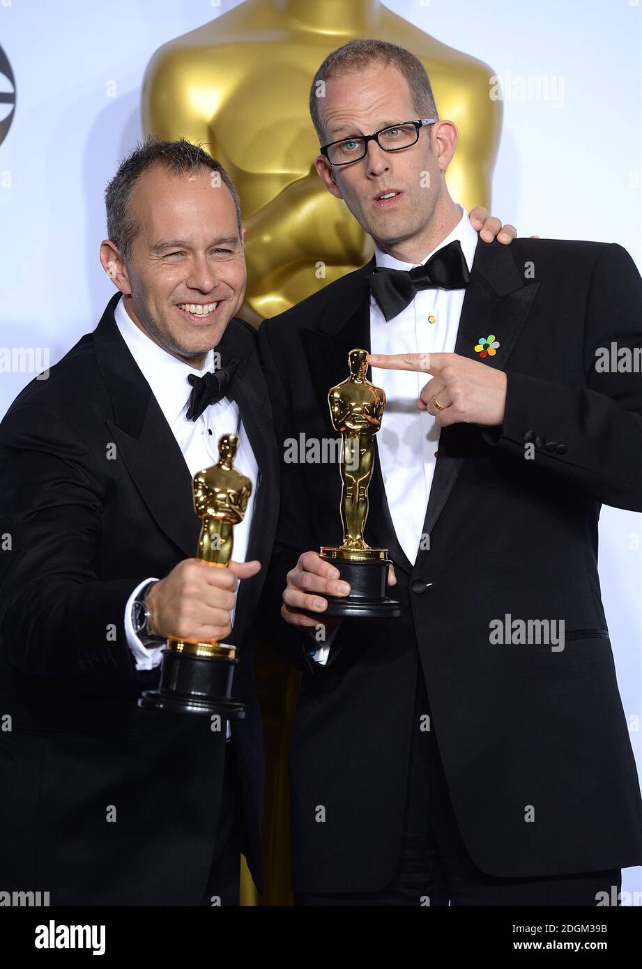 Pete Docter (right) and Jonas Rivera (left) with the Academy Award for ...