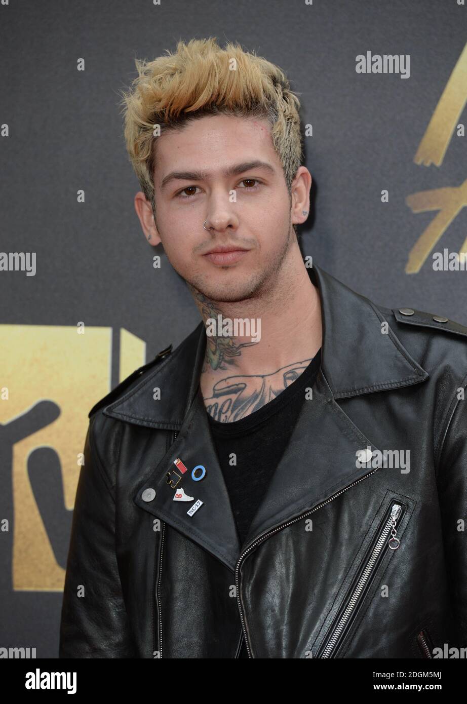 T. Mills arriving at the 2016 MTV Movie Awards, Warner Bros Studios ...