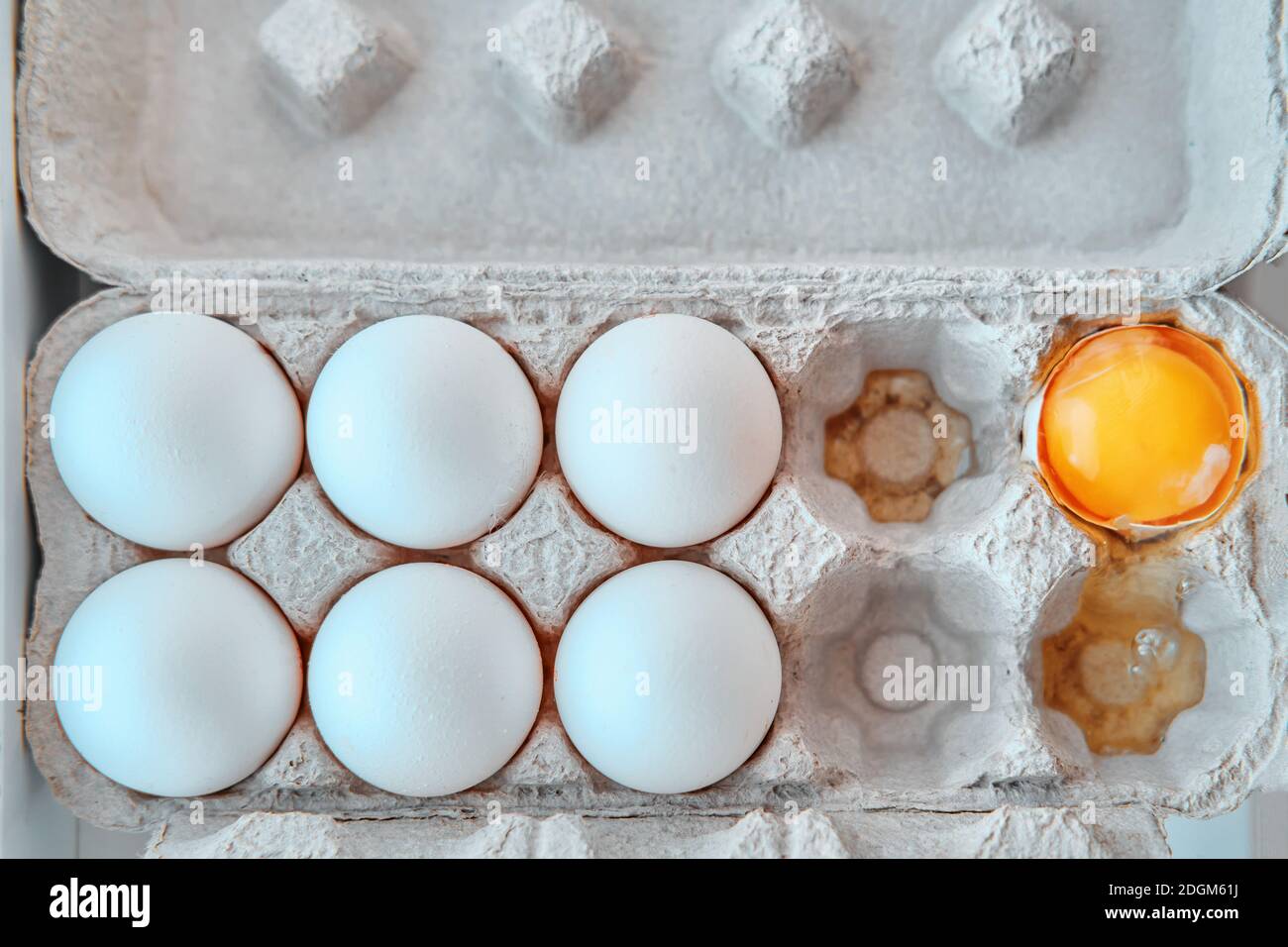 Egg is damaged in a bag of 10 pieces and spilled into a cardboard ...