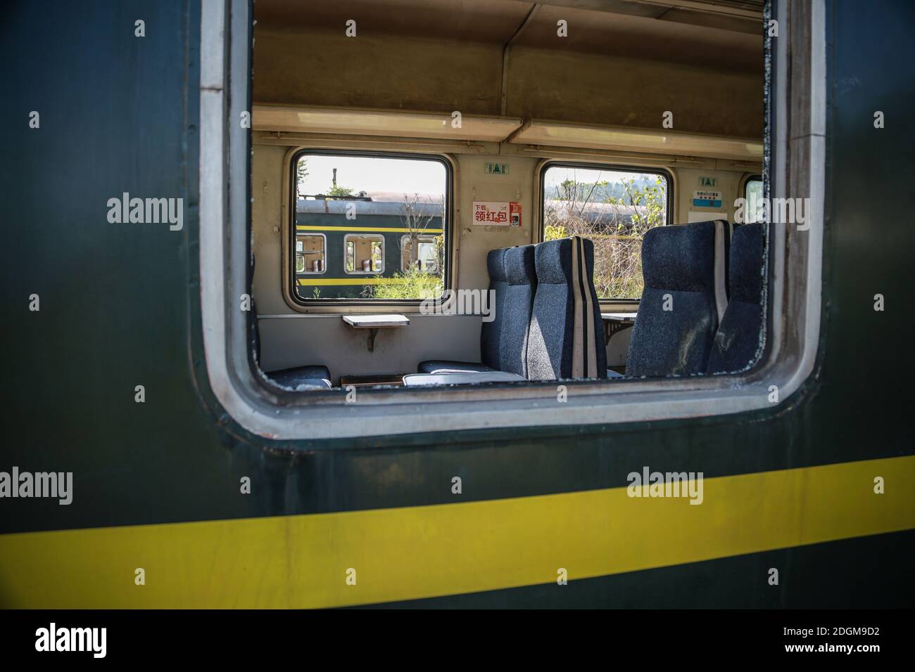 There are piles of abandoned green-skinned trains on the train ...