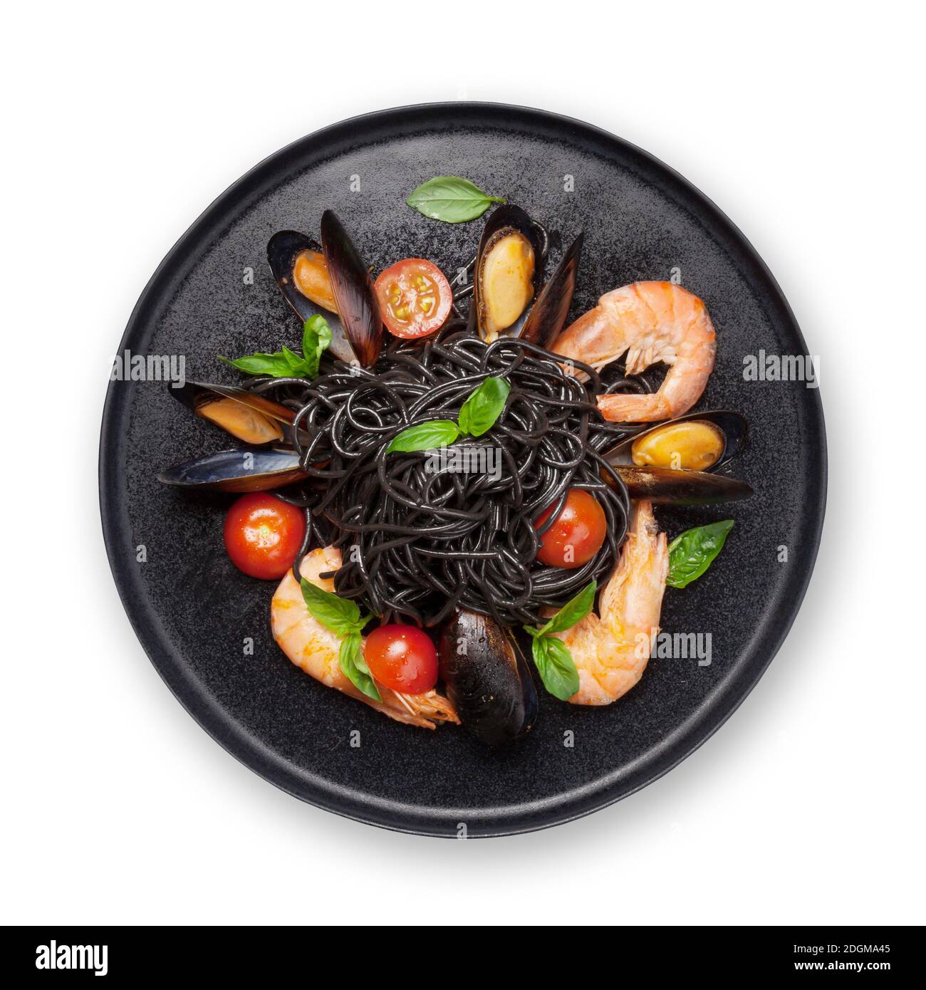 Black squid ink spaghetti pasta with seafood, tomatoes and basil ...