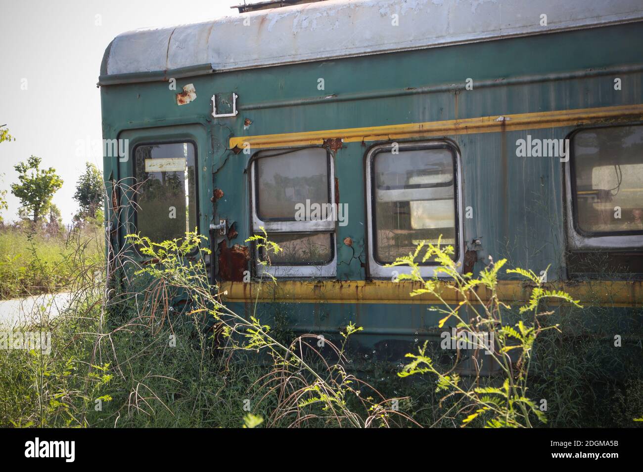There are piles of abandoned green-skinned trains on the train ...