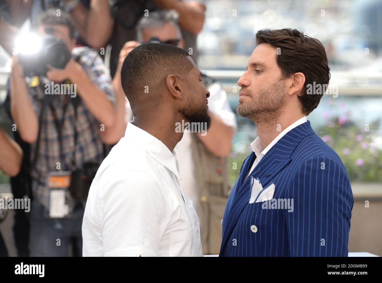 Usher Raymond IV and Edgar Ramirez attending the Hands of Stone ...