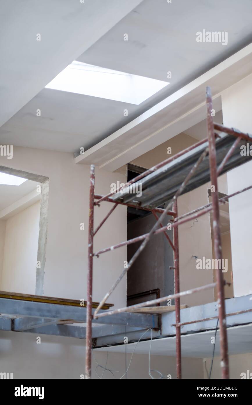Interior of construction site with scaffolding Stock Photo - Alamy