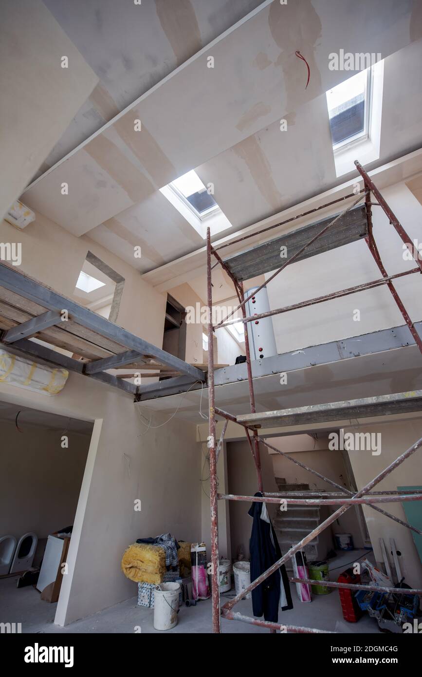 Interior of construction site with scaffolding Stock Photo - Alamy