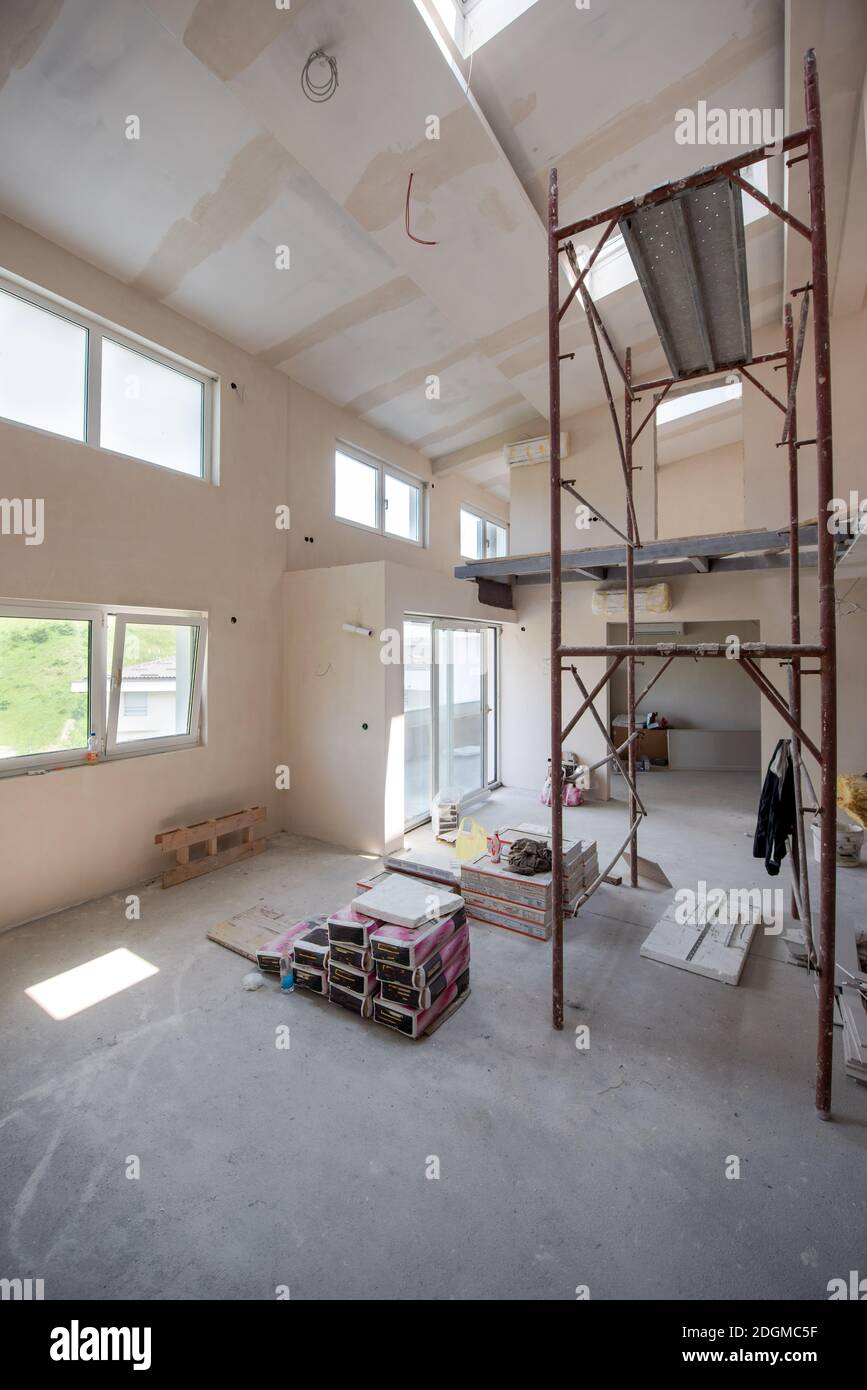 Interior of construction site with scaffolding Stock Photo - Alamy