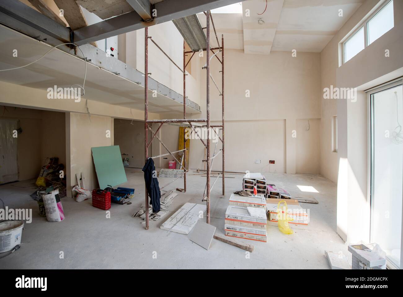 Interior of construction site with scaffolding Stock Photo - Alamy