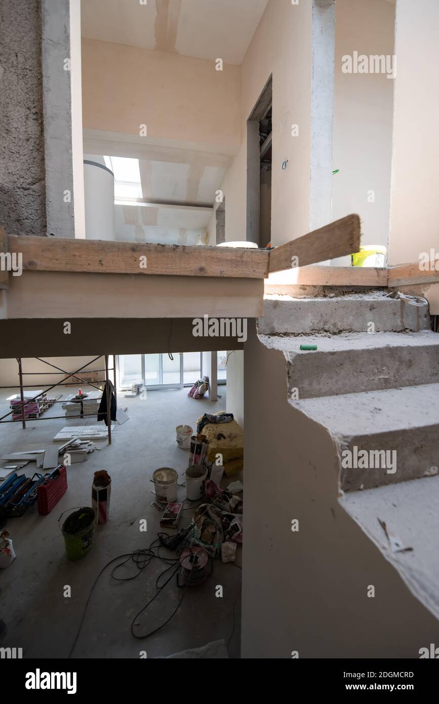 Interior of construction site with scaffolding Stock Photo - Alamy