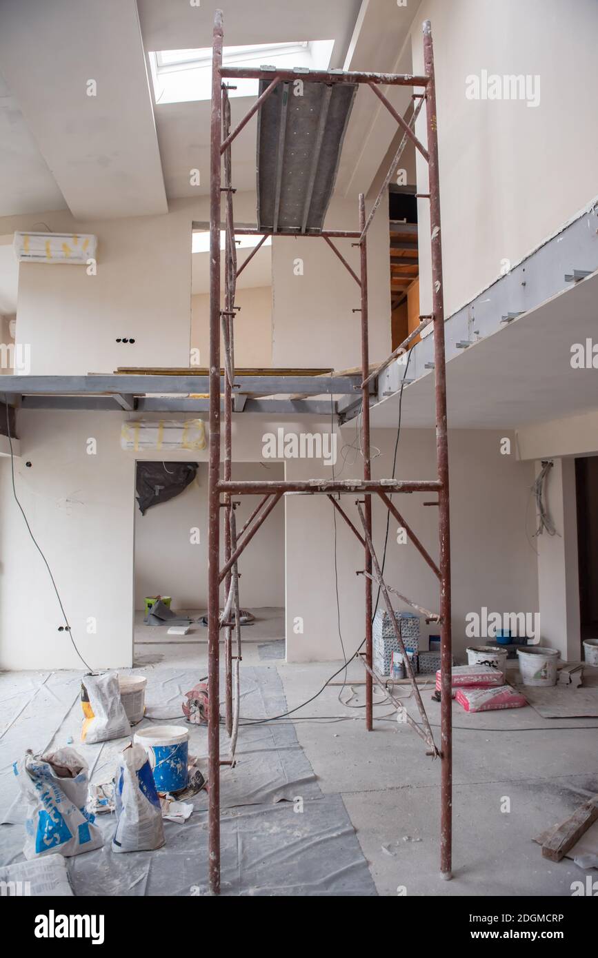 Interior of construction site with scaffolding Stock Photo - Alamy