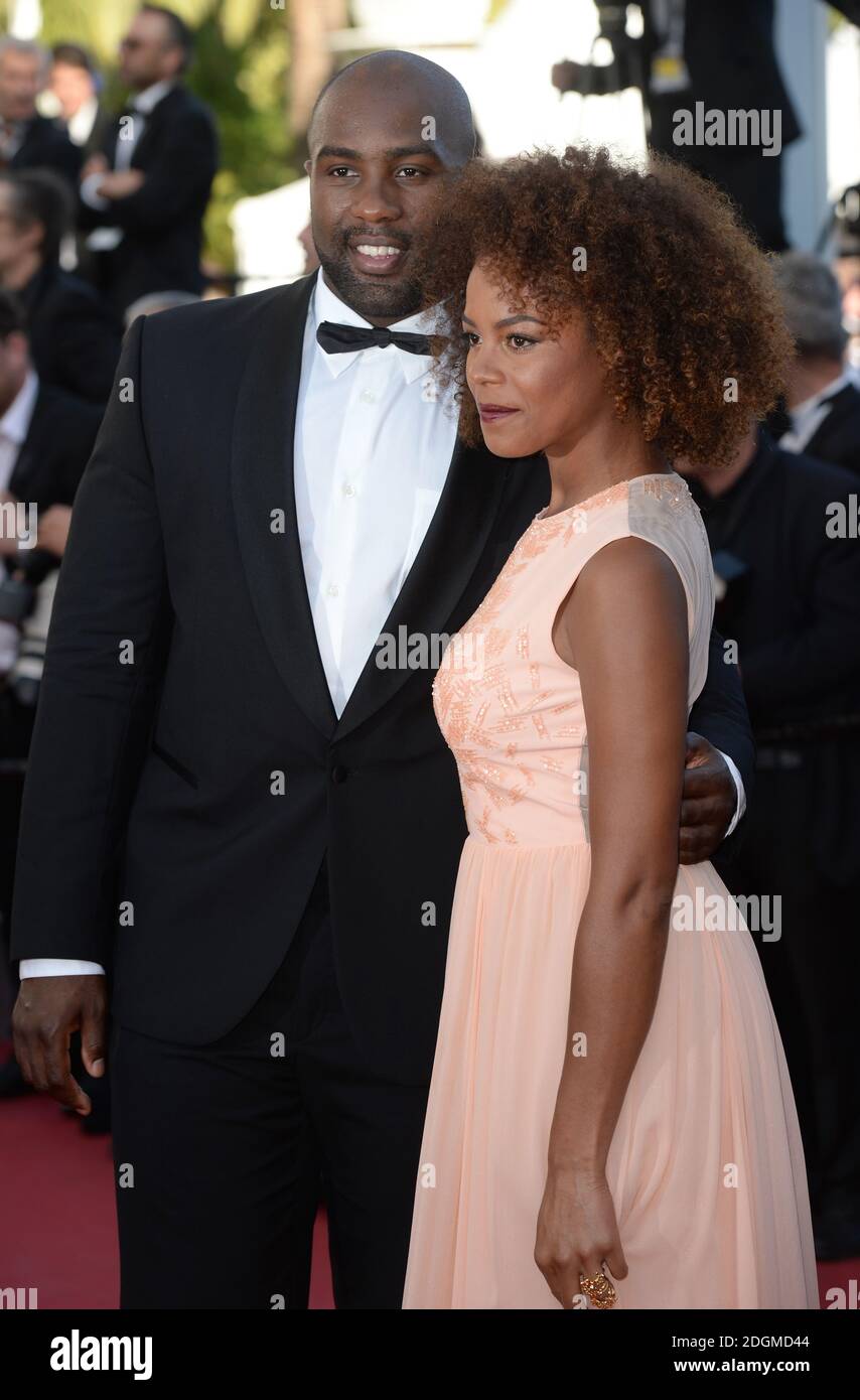 Teddy Riner and Luthna Plocus attending the Elle premiere at the Palais ...