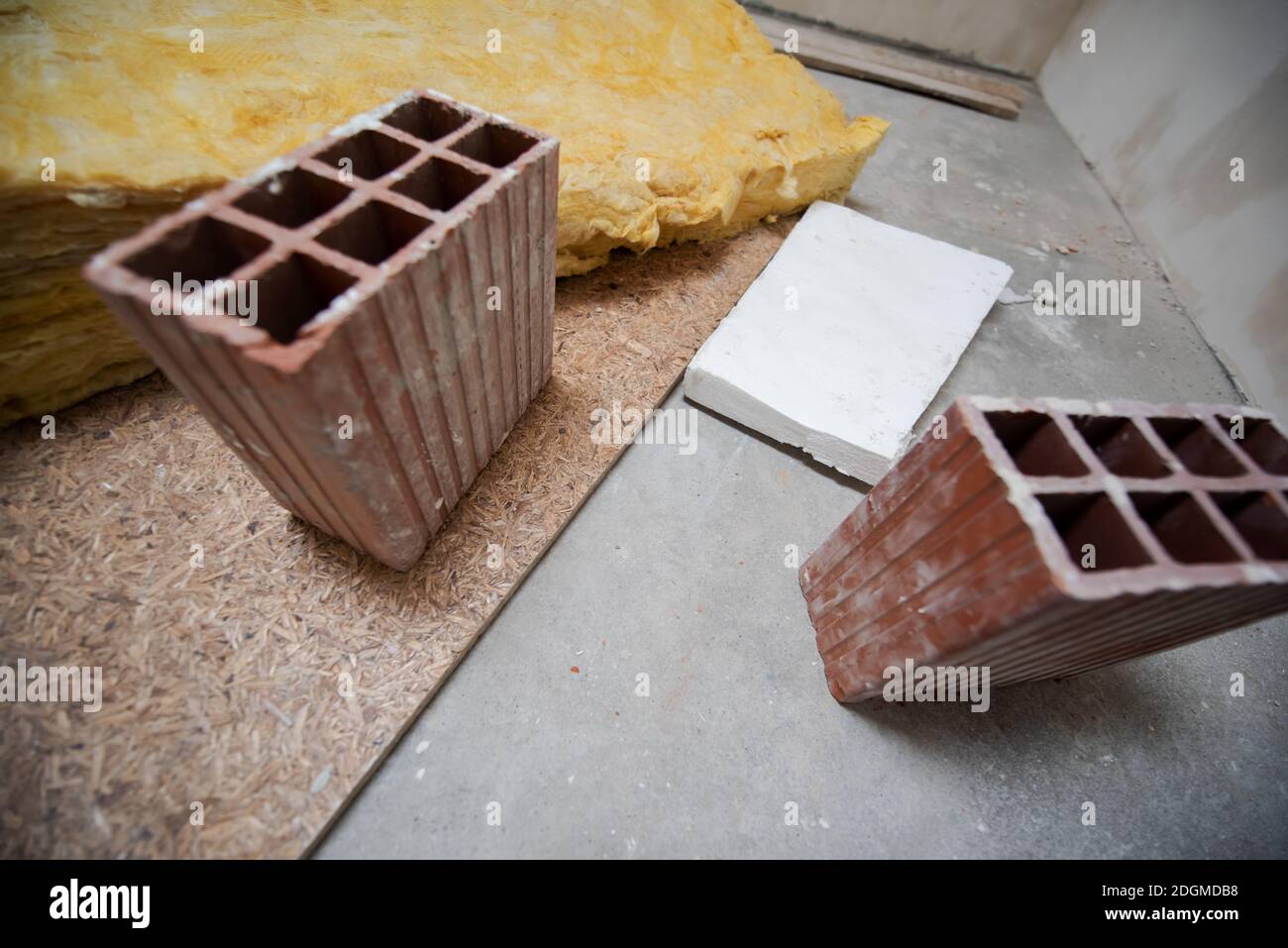 Red Bricks and glass wool Stock Photo - Alamy